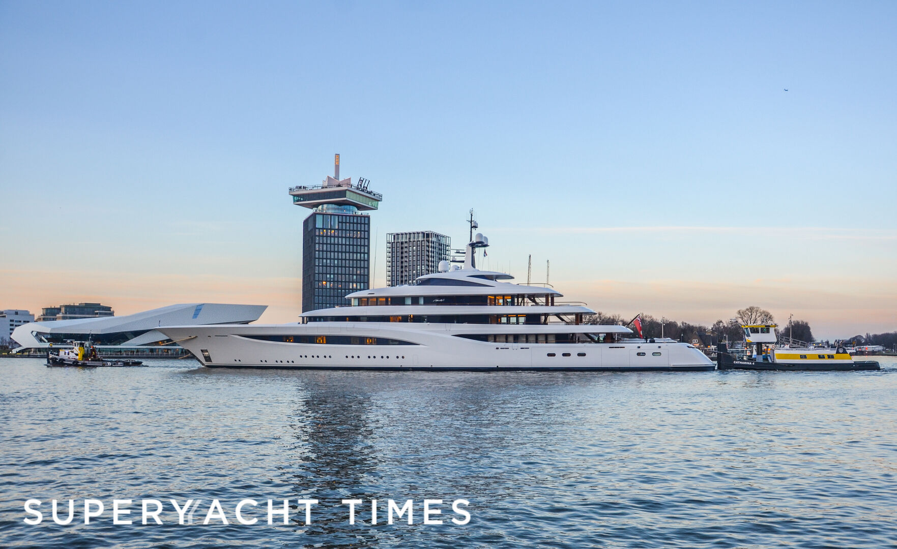 In Pictures: 96m Feadship superyacht Faith moving through Amsterdam