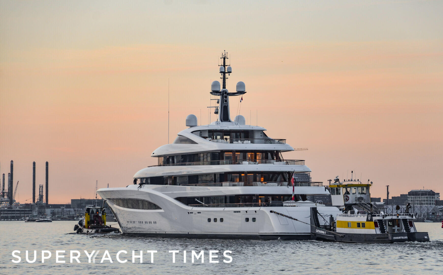 In Pictures: 96m Feadship superyacht Faith moving through Amsterdam