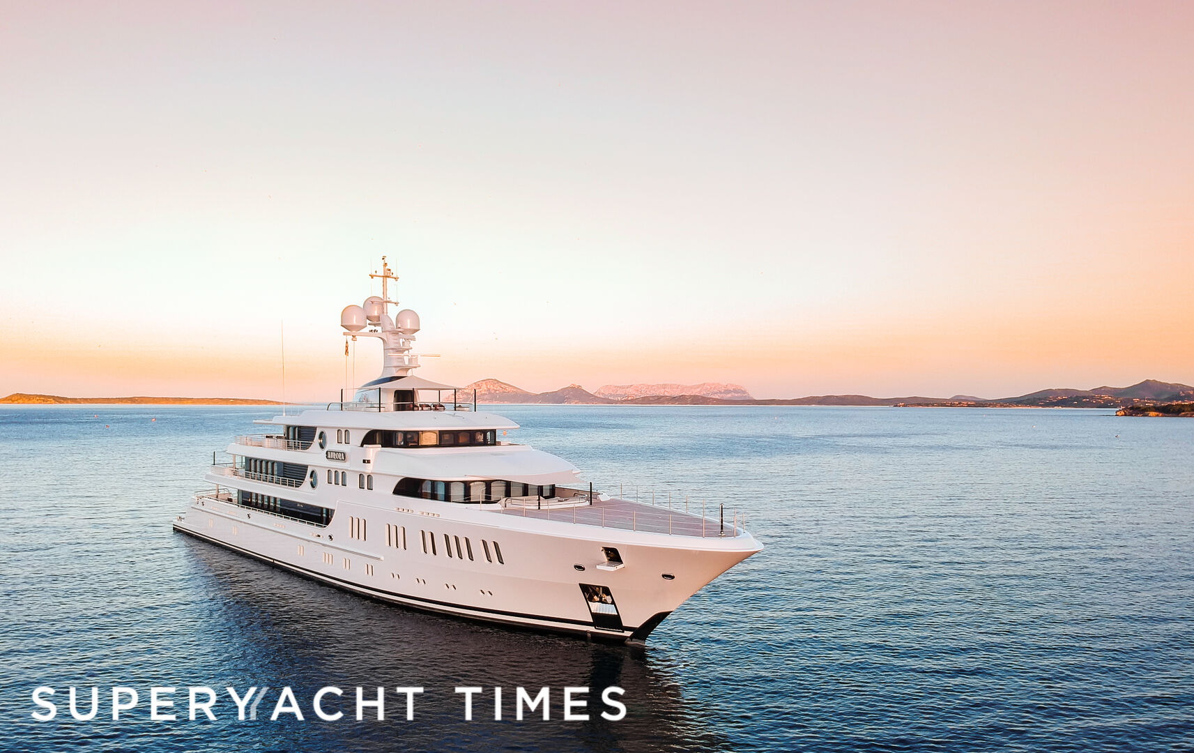 The 74m custom superyacht Aurora at sunset